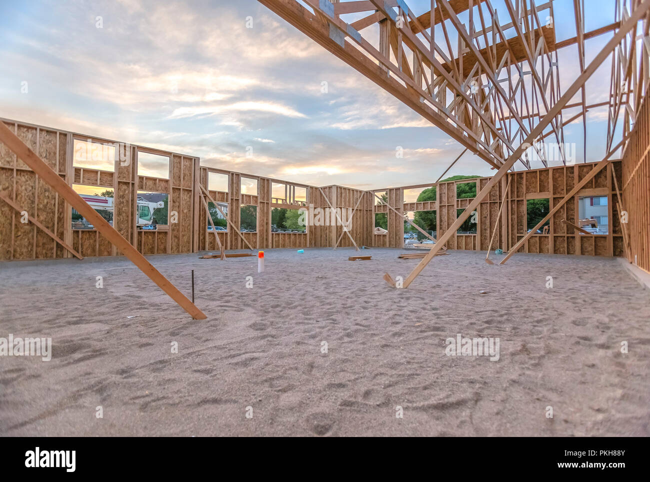Sand and wooden beams in new construction Stock Photo - Alamy