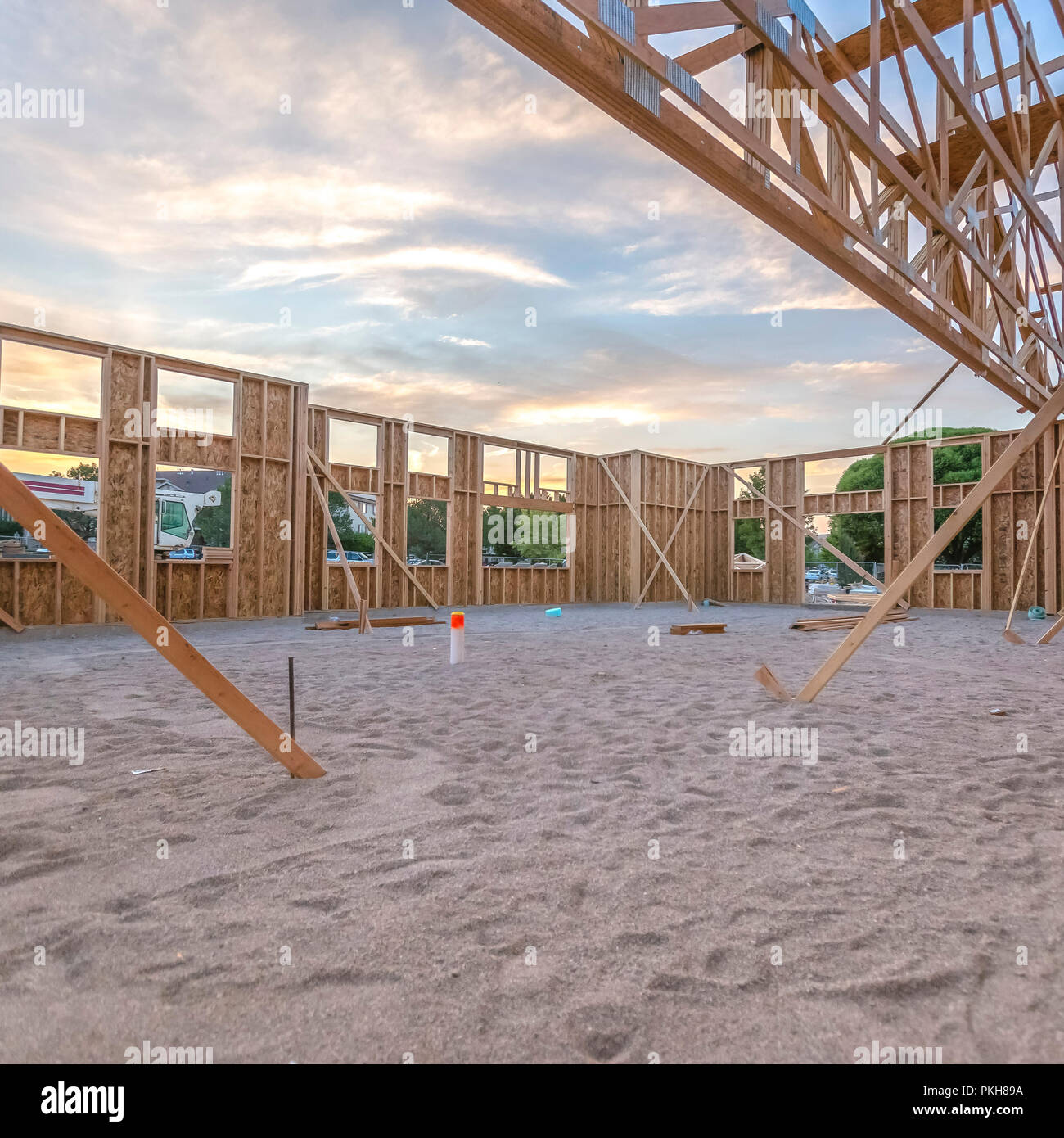 Sand and wooden beams new construction sand area Stock Photo - Alamy