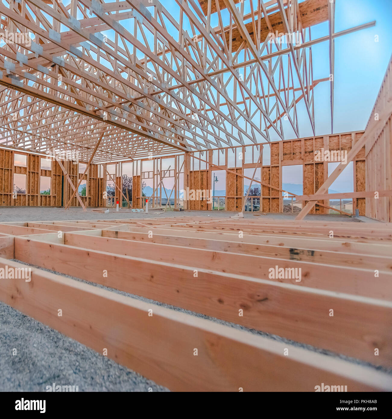 Sand floor and wooden beams new yard wide square Stock Photo - Alamy