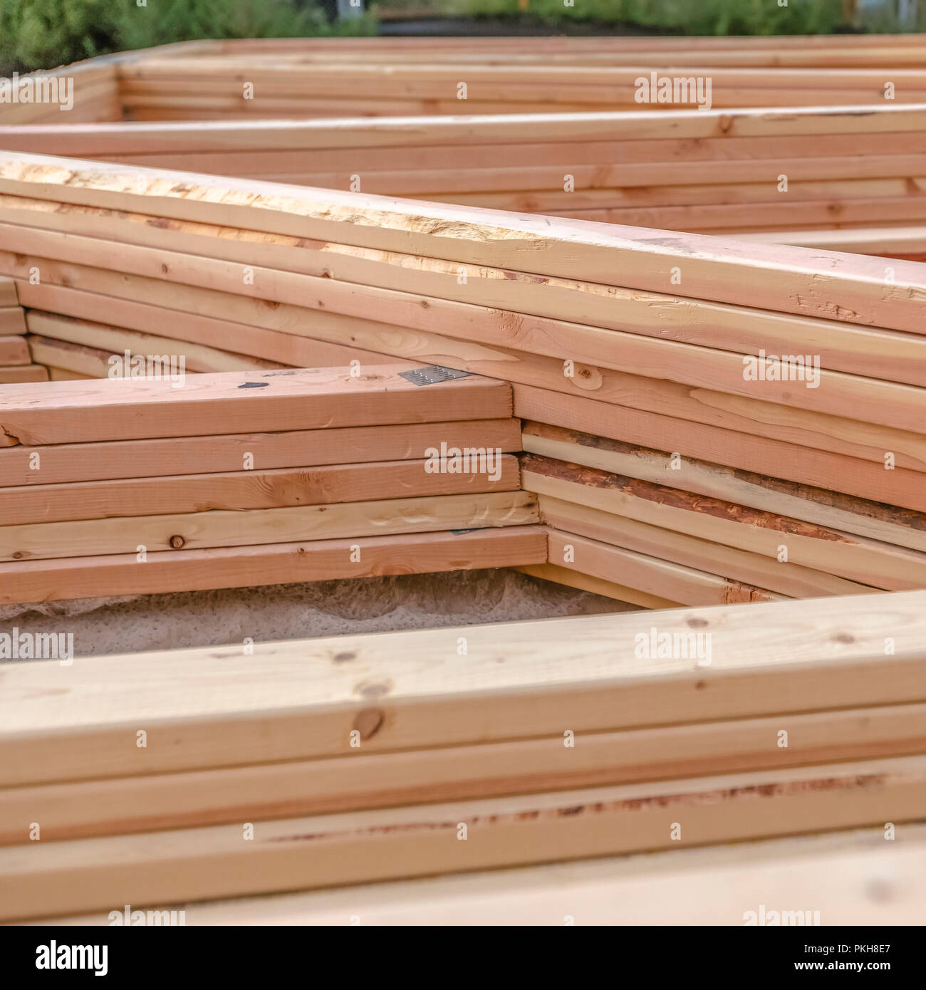 Stacked segments of rooftop construction square Stock Photo - Alamy
