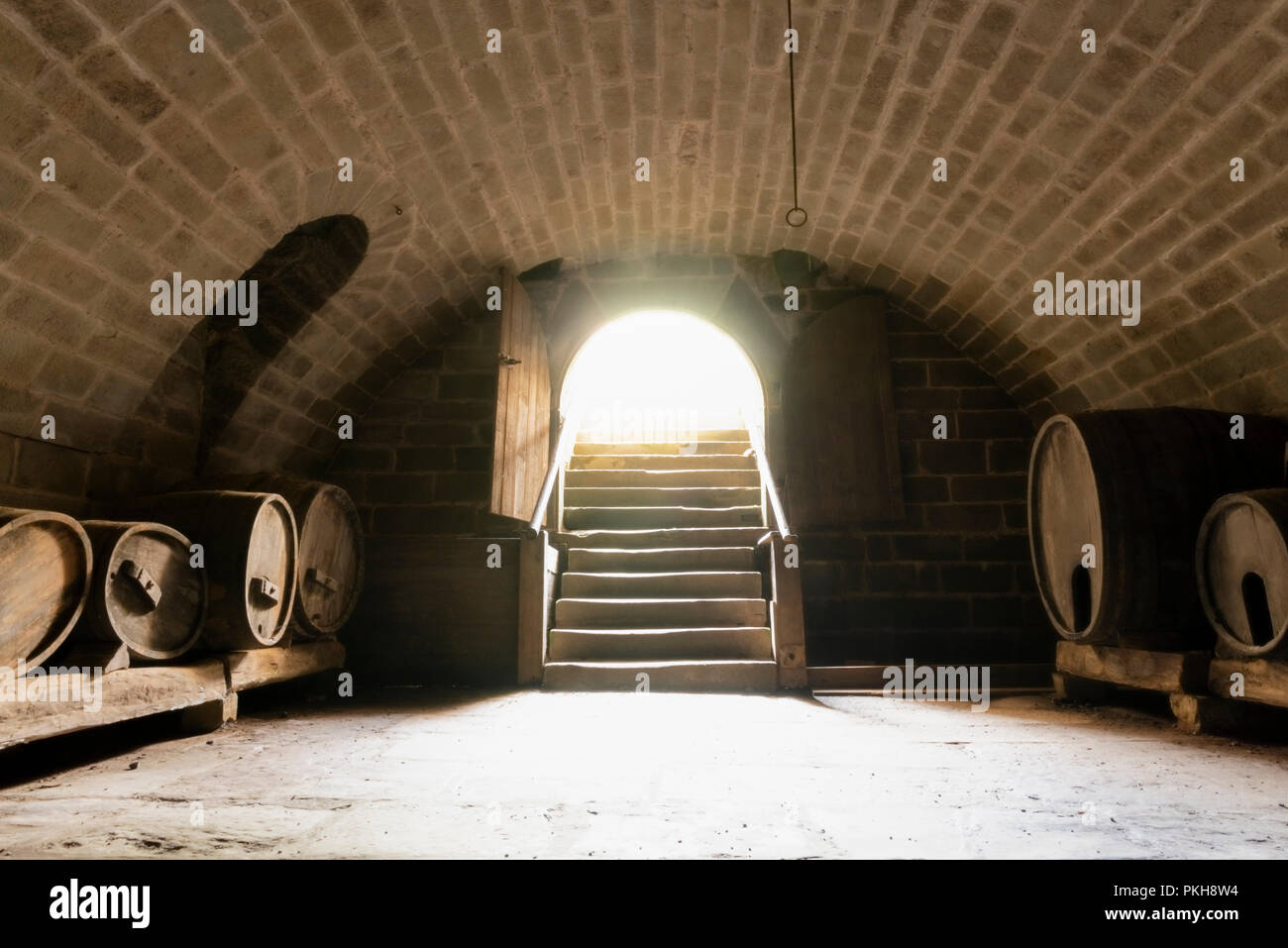 Image inside an abandoned medieval wine cellar with round ceiling and ...