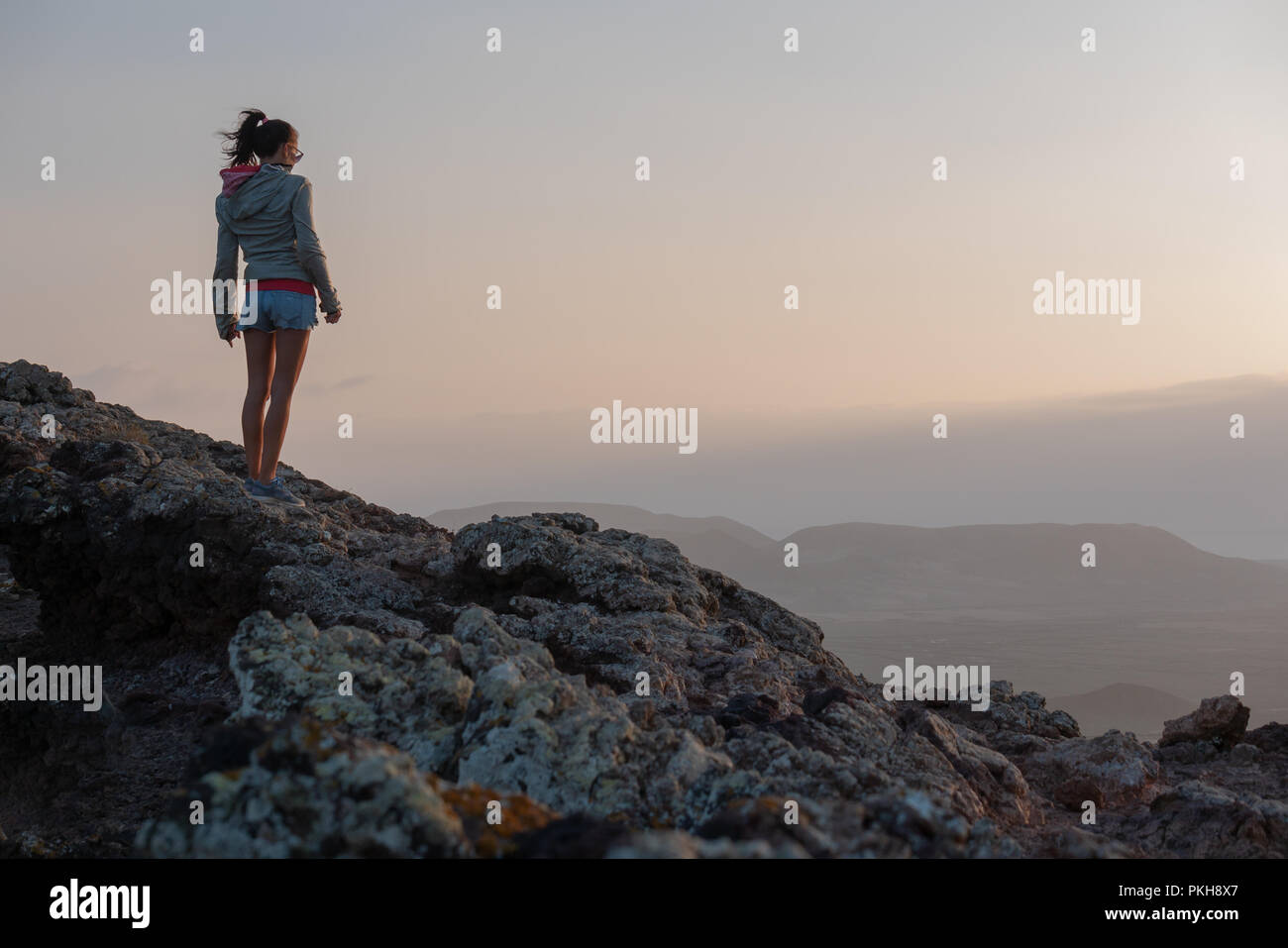 girl on the peak of the volcano, fuerteventura Stock Photo - Alamy