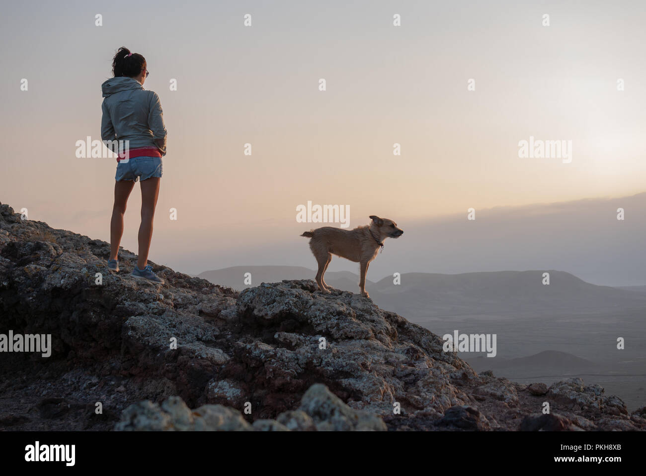 girl on the top of the volcano with her dog, fuerteventura canary ...