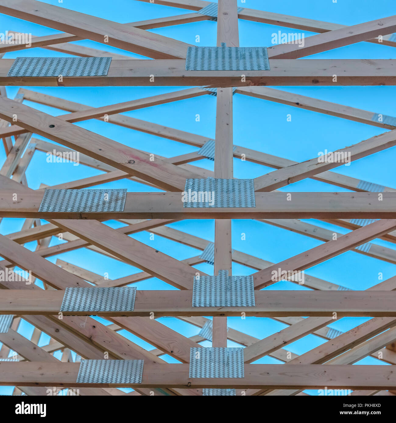 The horizontal beams of a wooden building square Stock Photo - Alamy