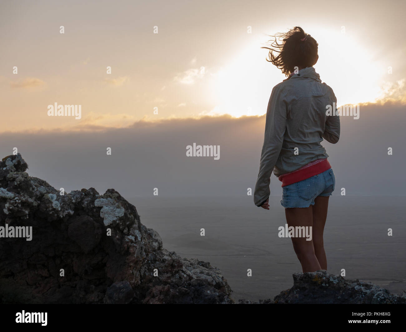 girl on the peak of the volcano, fuerteventura Stock Photo - Alamy