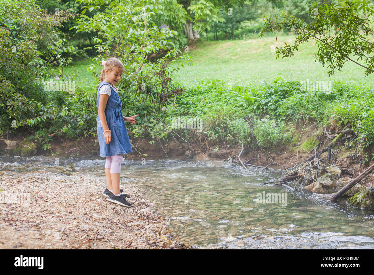 Child Summer Day in Nature at Forest Stream Stock Photo - Alamy