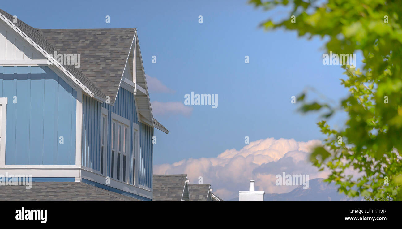 Upper floor of a house view against a blue sky Stock Photo - Alamy