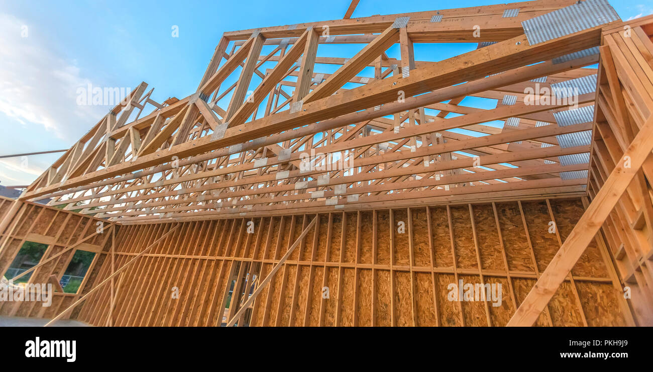 Upper roof area of new constructed building pano Stock Photo - Alamy