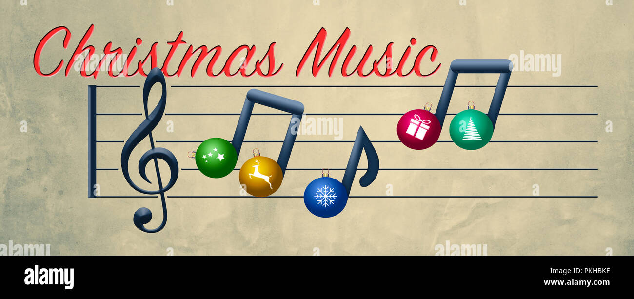 Musical notes made of Christmas ornaments float on a treble clef in ...