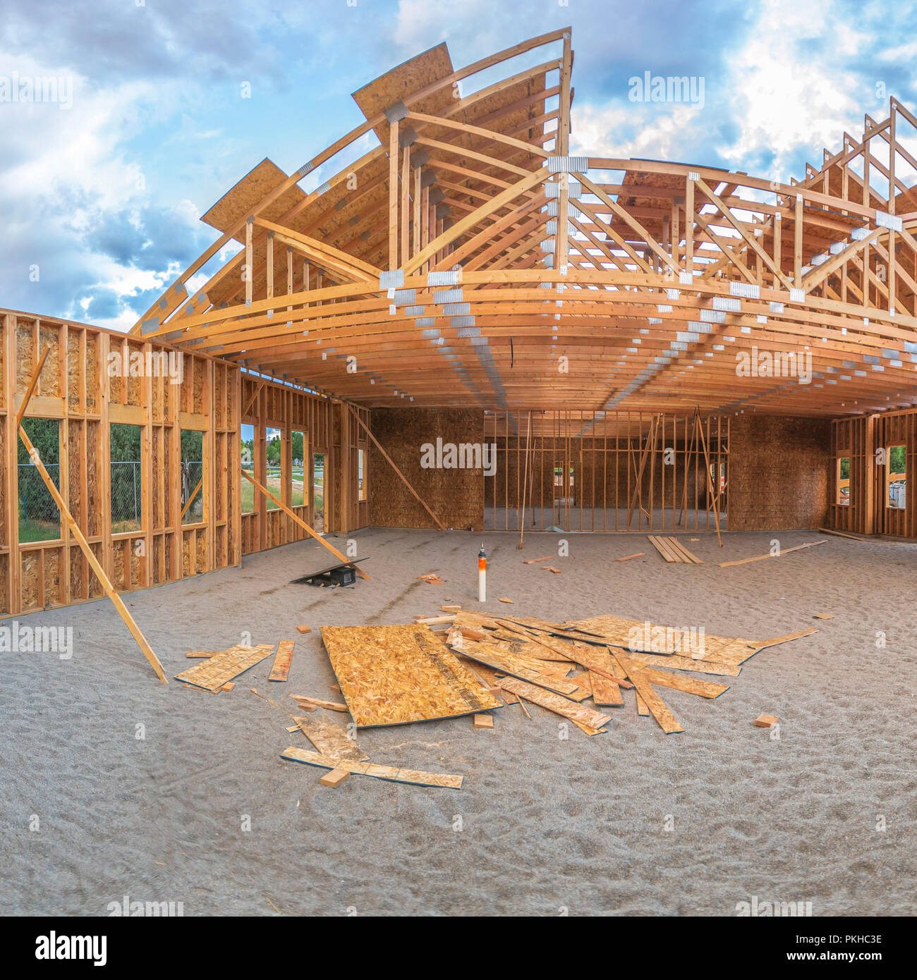 Wide view of building being constructed square Stock Photo - Alamy