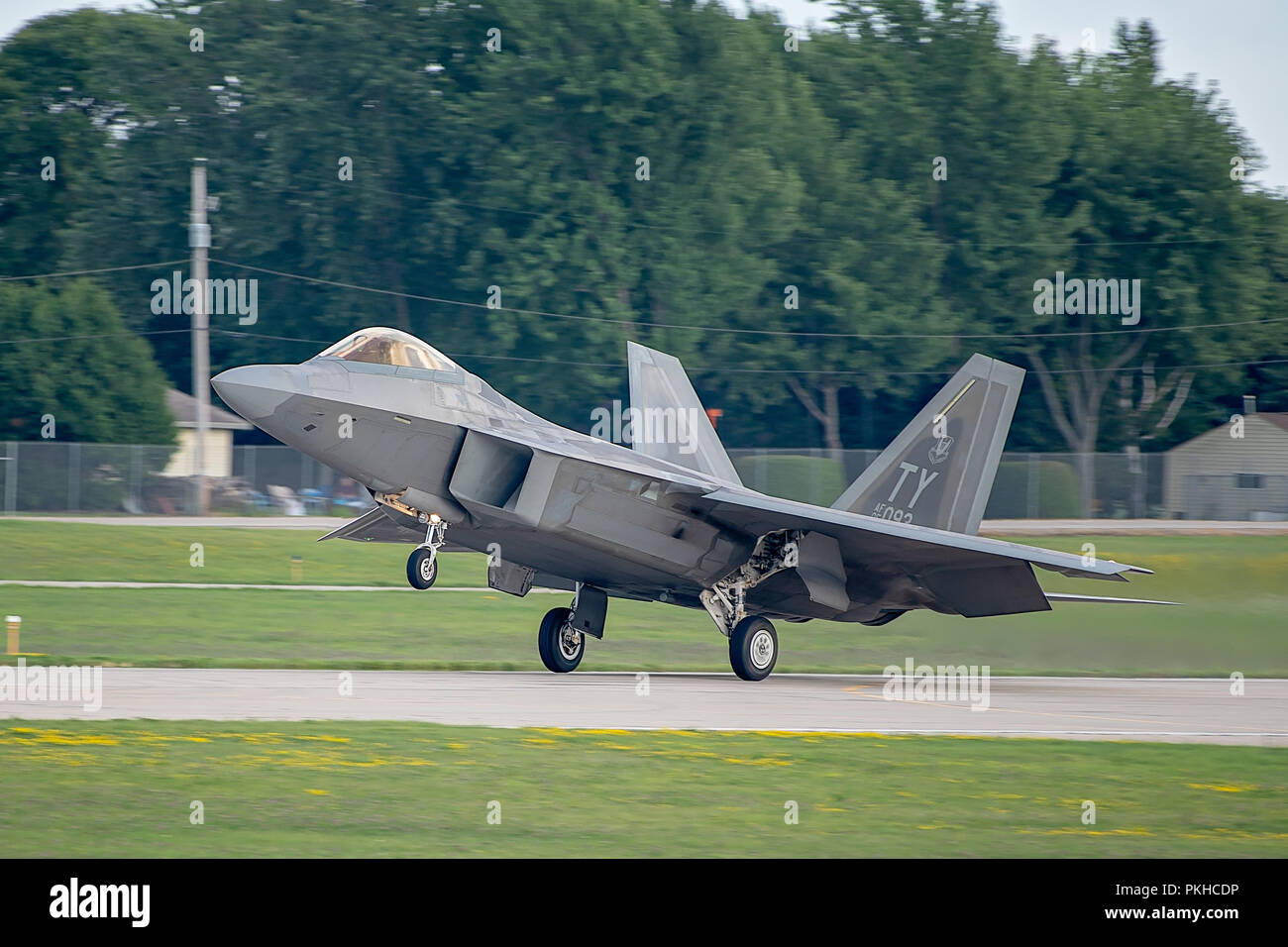Oshkosh, WI - 28 July 2018: A F-22 taking off or landing at an airshow ...
