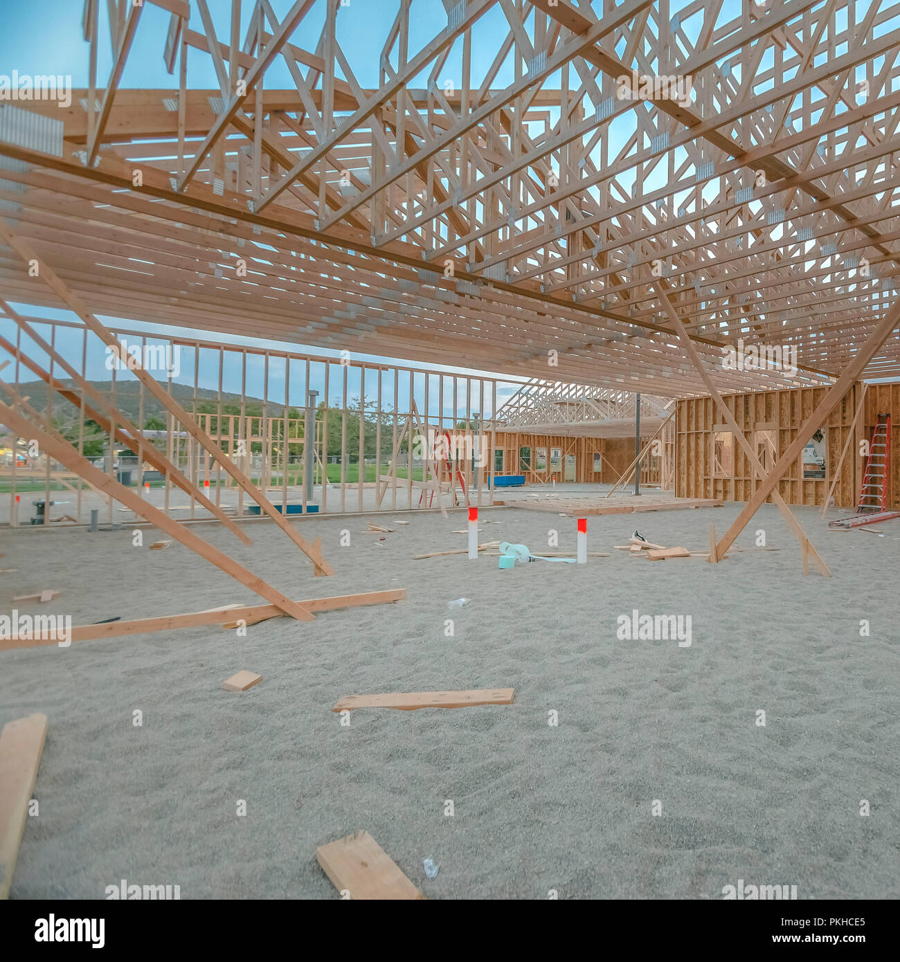Wooden beams in new building wide angle square Stock Photo - Alamy