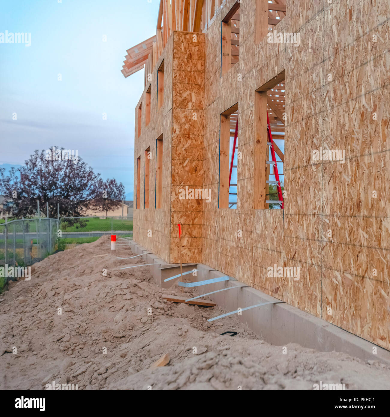 Wooden boards of a new construct building square Stock Photo - Alamy