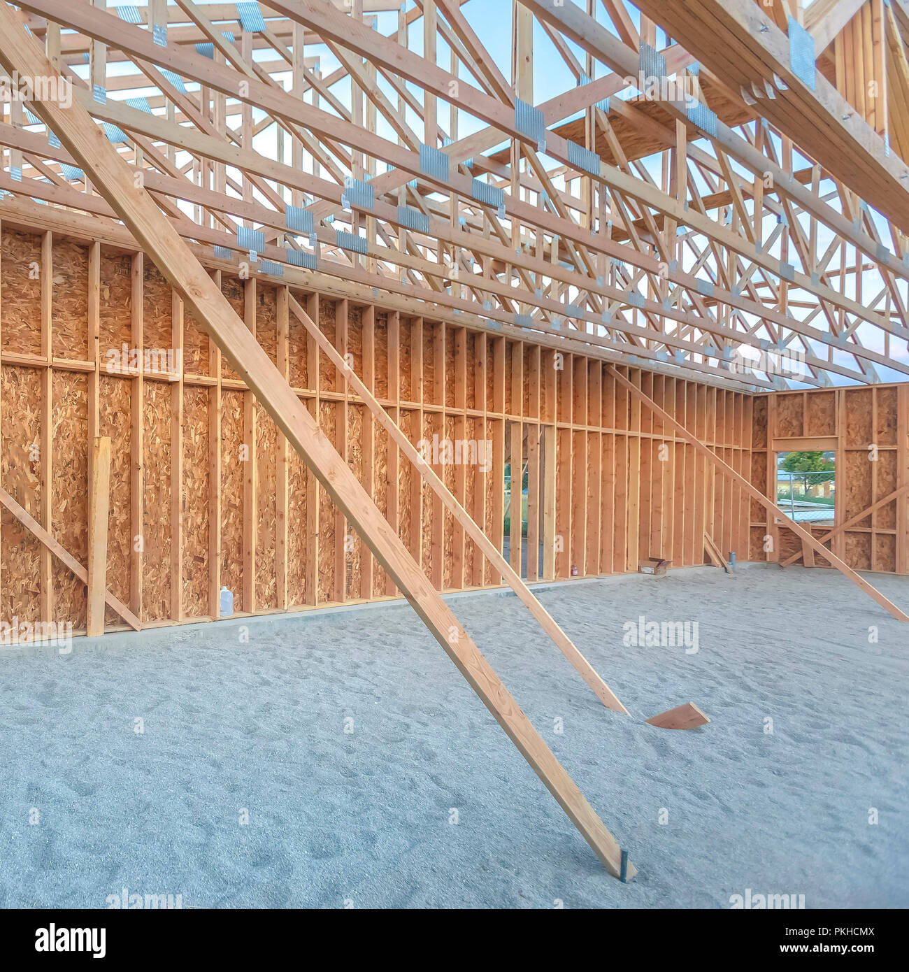 Wooden construction of building sand pit square Stock Photo - Alamy