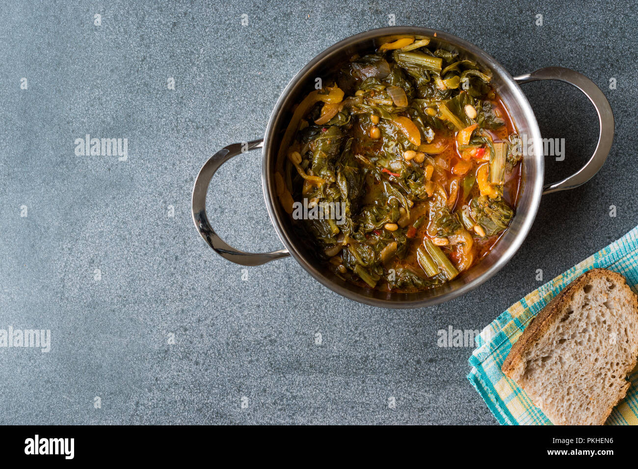 Homemade Healthy Chard with Rice, Onions and Tomato Paste in Metal Pot ...