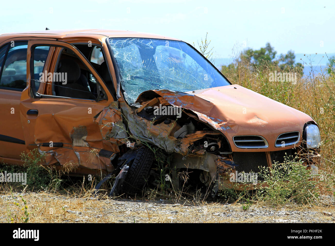 Crushed small car in bad traffic accident Stock Photo - Alamy