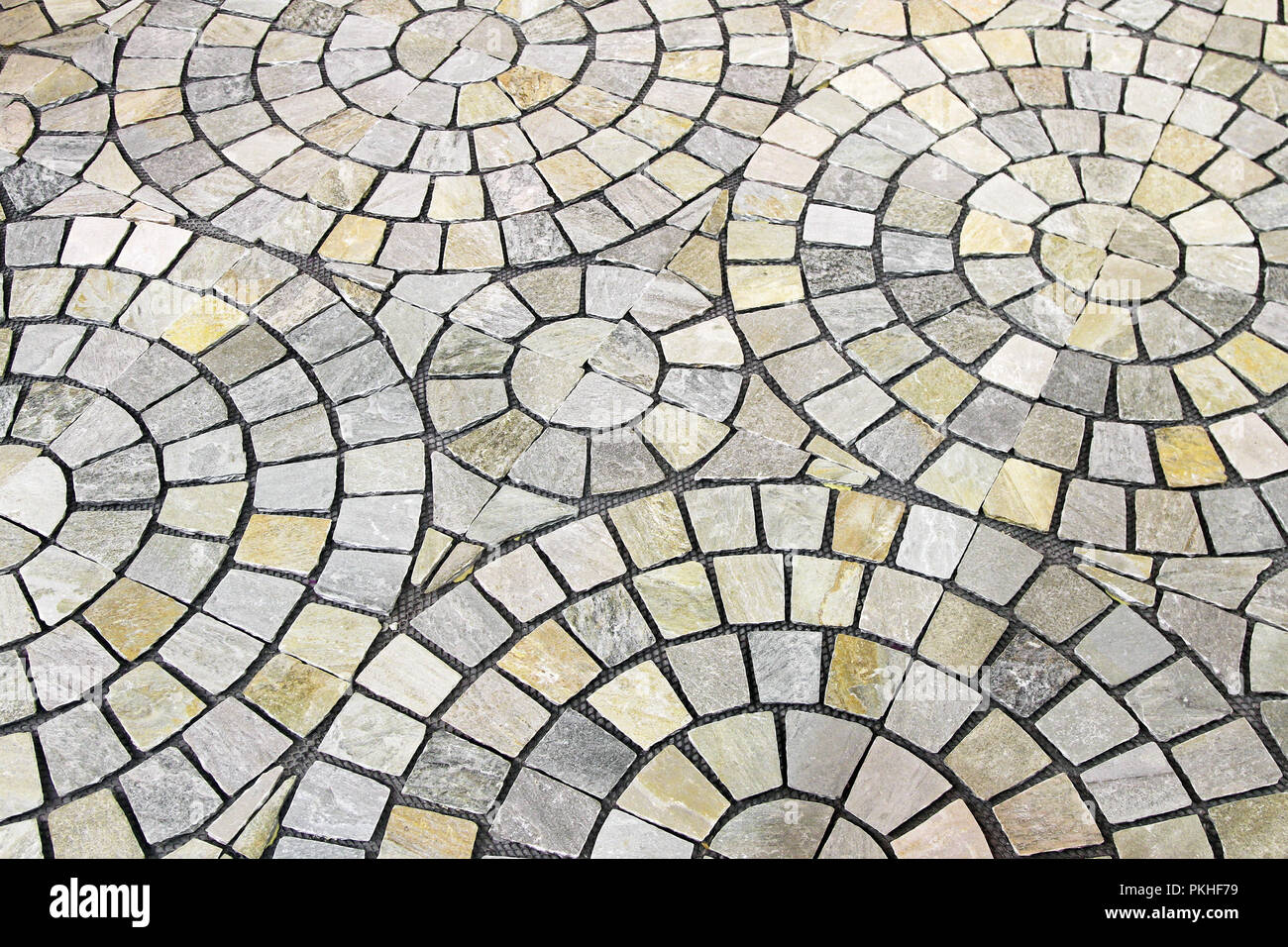 Circle pattern of new cobble stones ground Stock Photo - Alamy