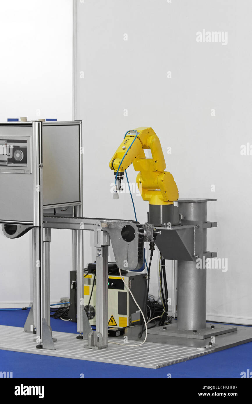 Robotic arm at production line in factory Stock Photo - Alamy