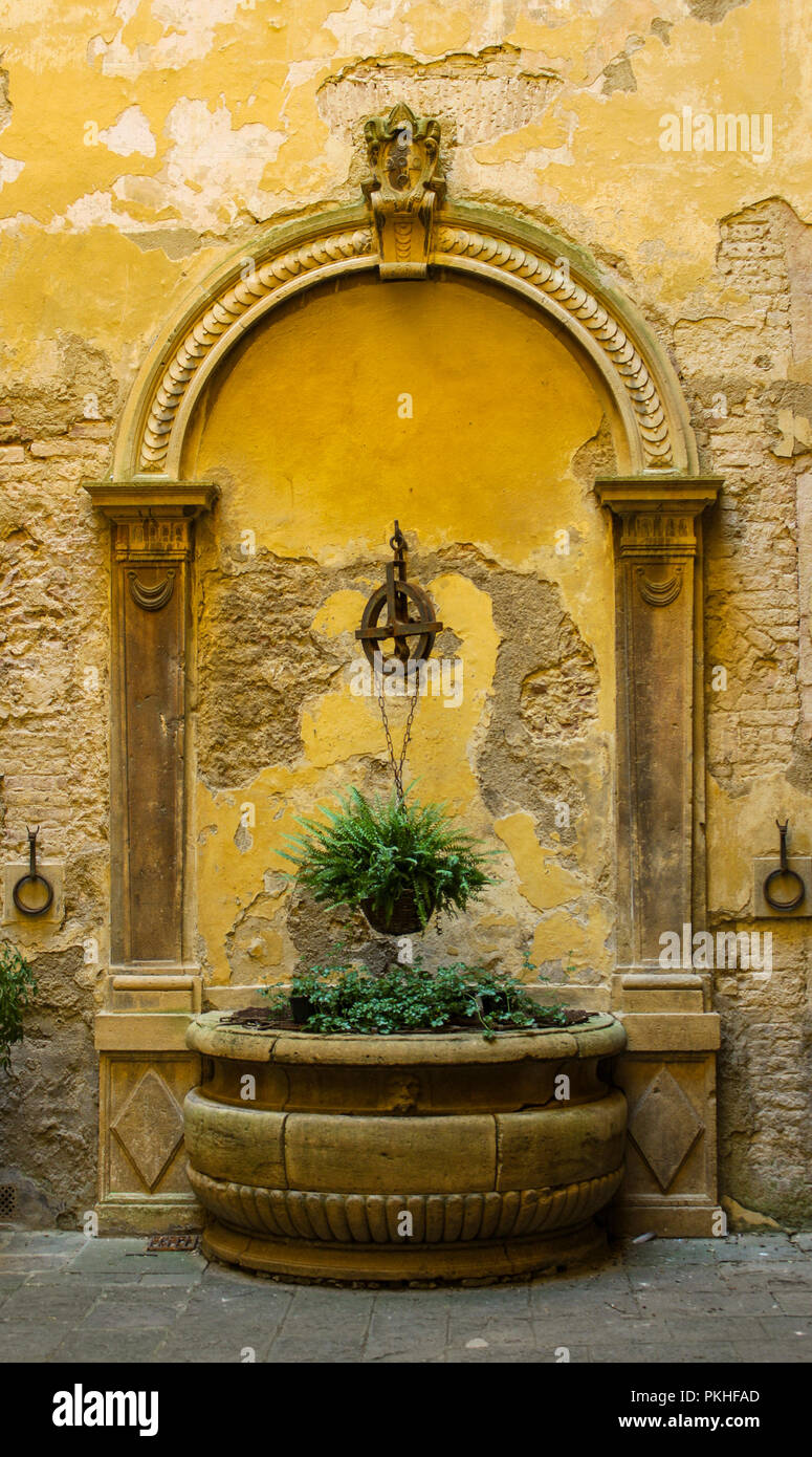 It use to be some well, but now is old kind of decoration in one of the ...