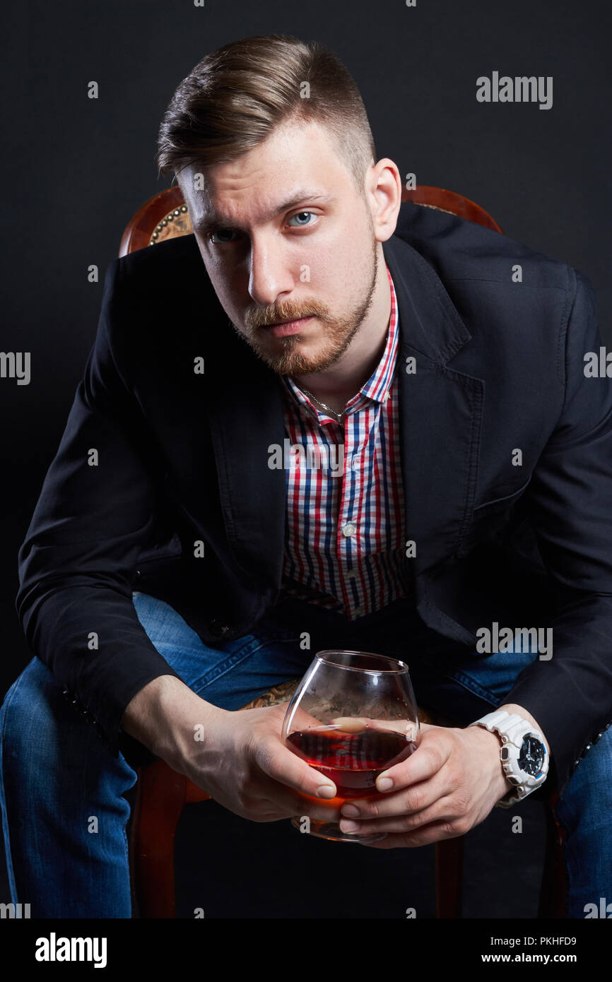 Male alcoholism, man with a glass of alcohol in hand. Disease of ...