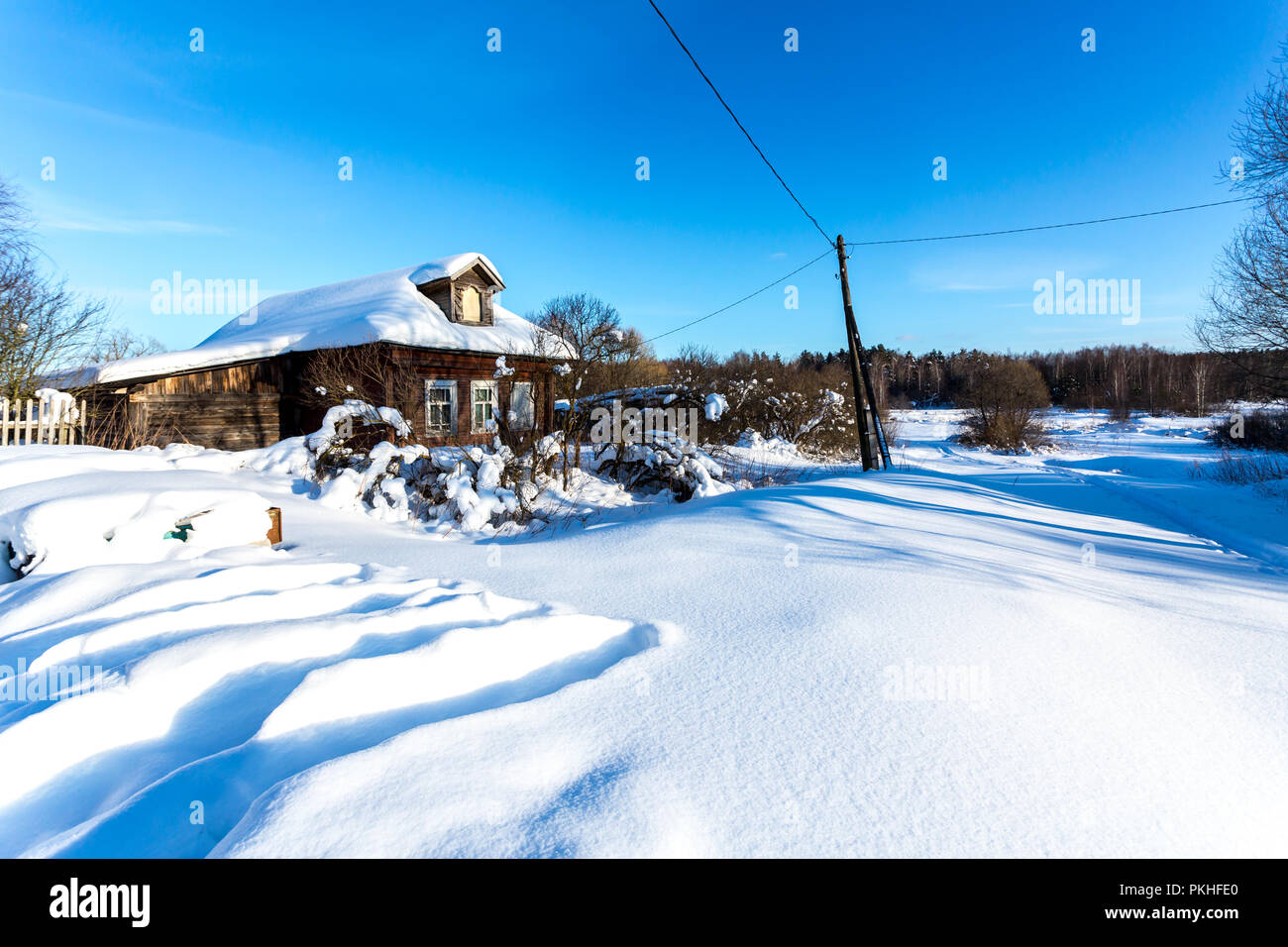 Traditional Russian village in snowy frost winter Stock Photo - Alamy