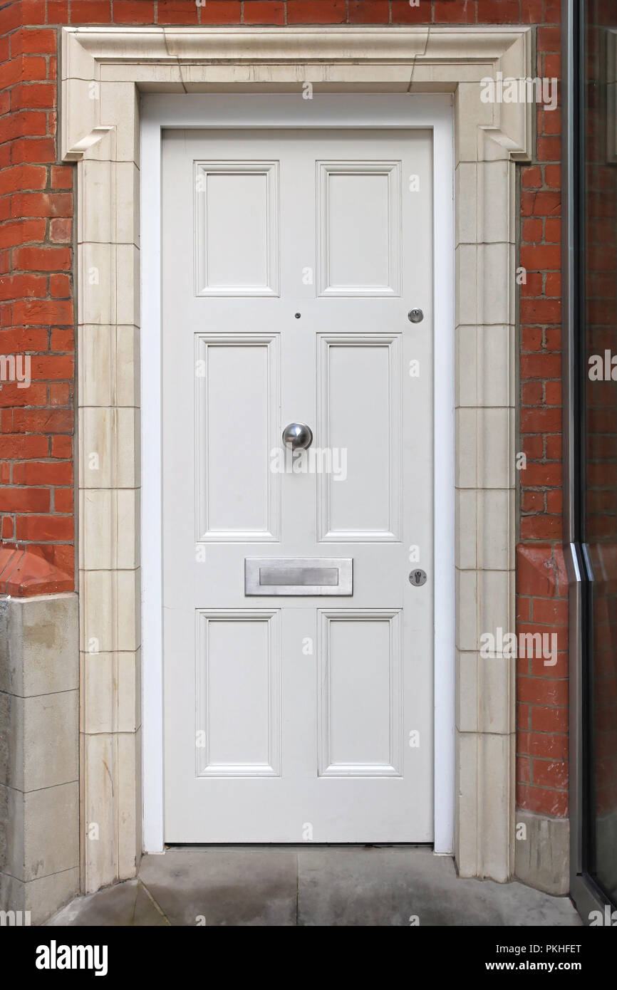 White entrance door at traditional English house Stock Photo - Alamy