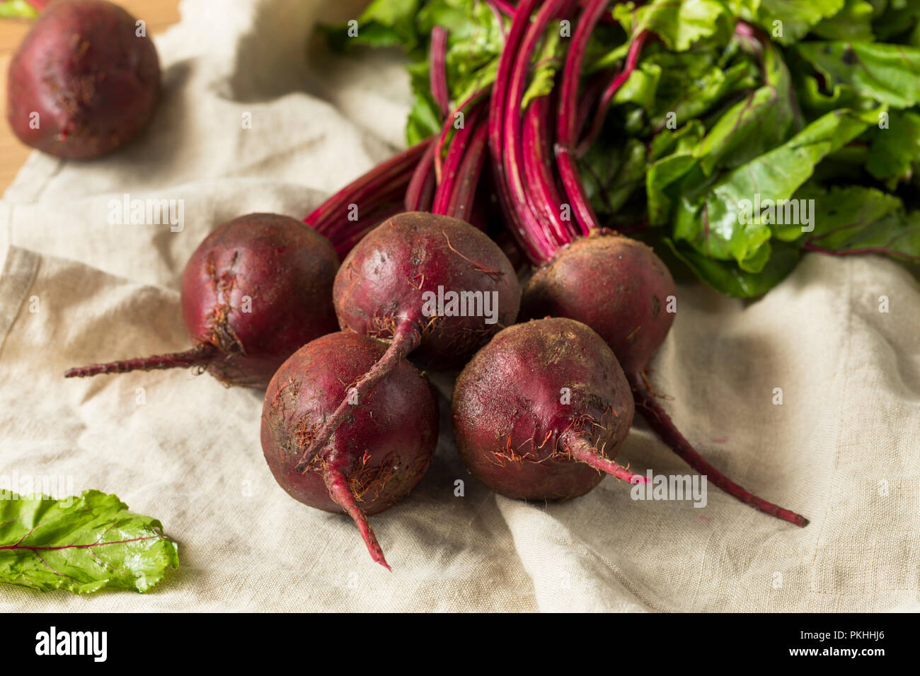 Raw Red Organic Beet Roots with Stems Stock Photo - Alamy