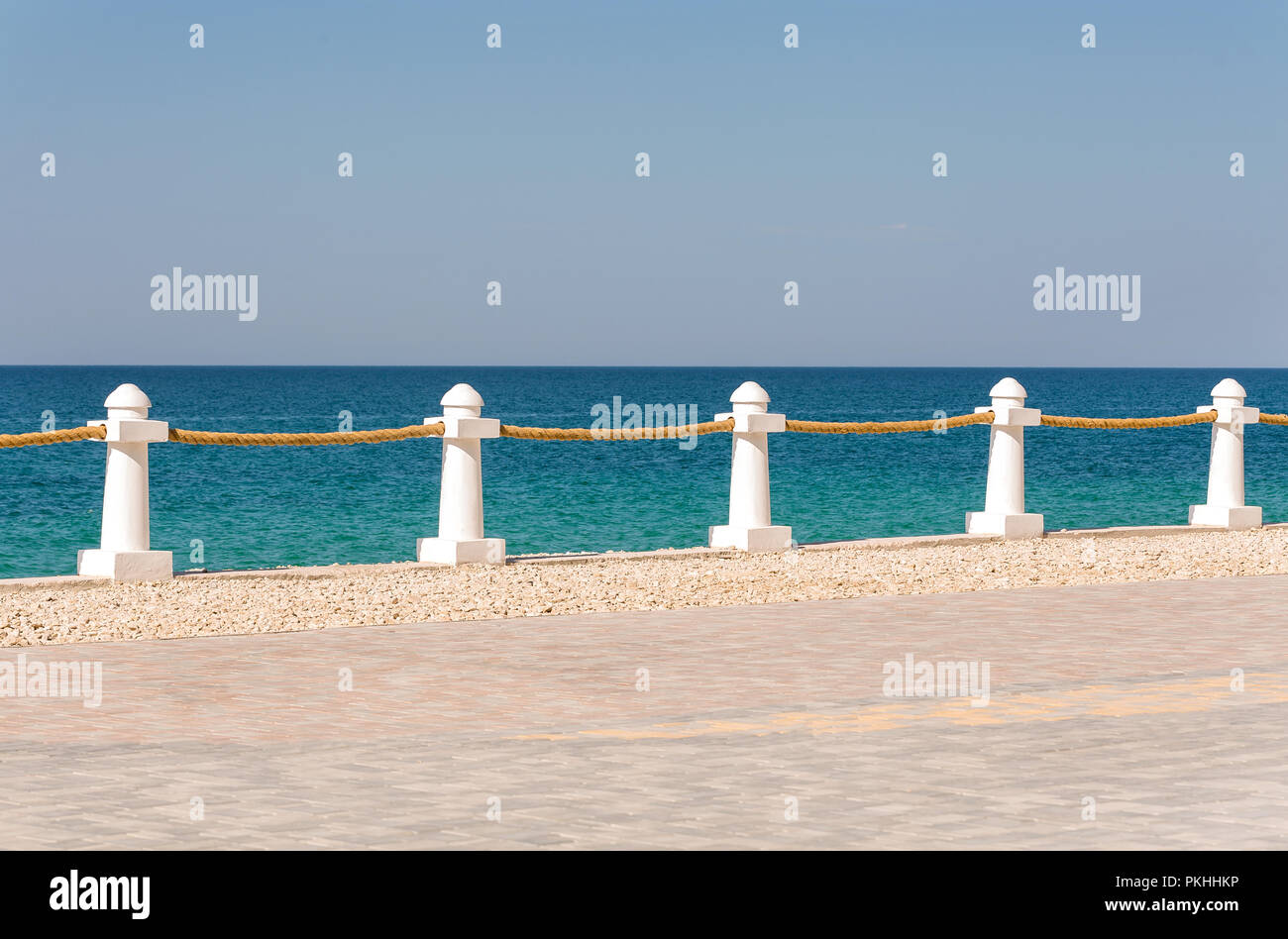 View from the embankment with columns by the sea. Rhythmic line Stock ...
