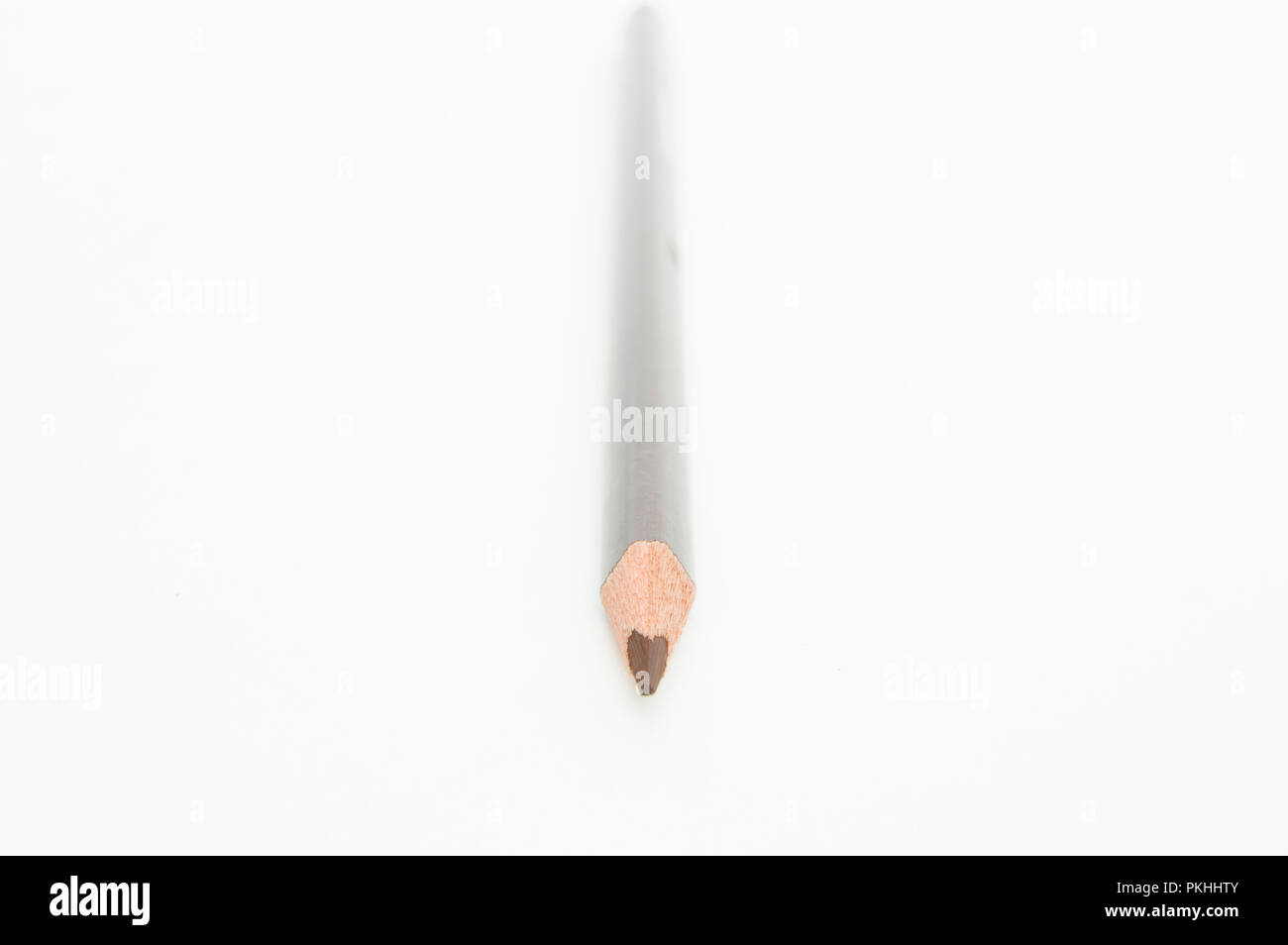 An isolated brown colored pencil on a white background Stock Photo - Alamy