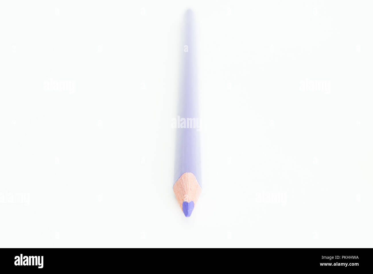An isolated violet colored pencil on a white background Stock Photo - Alamy
