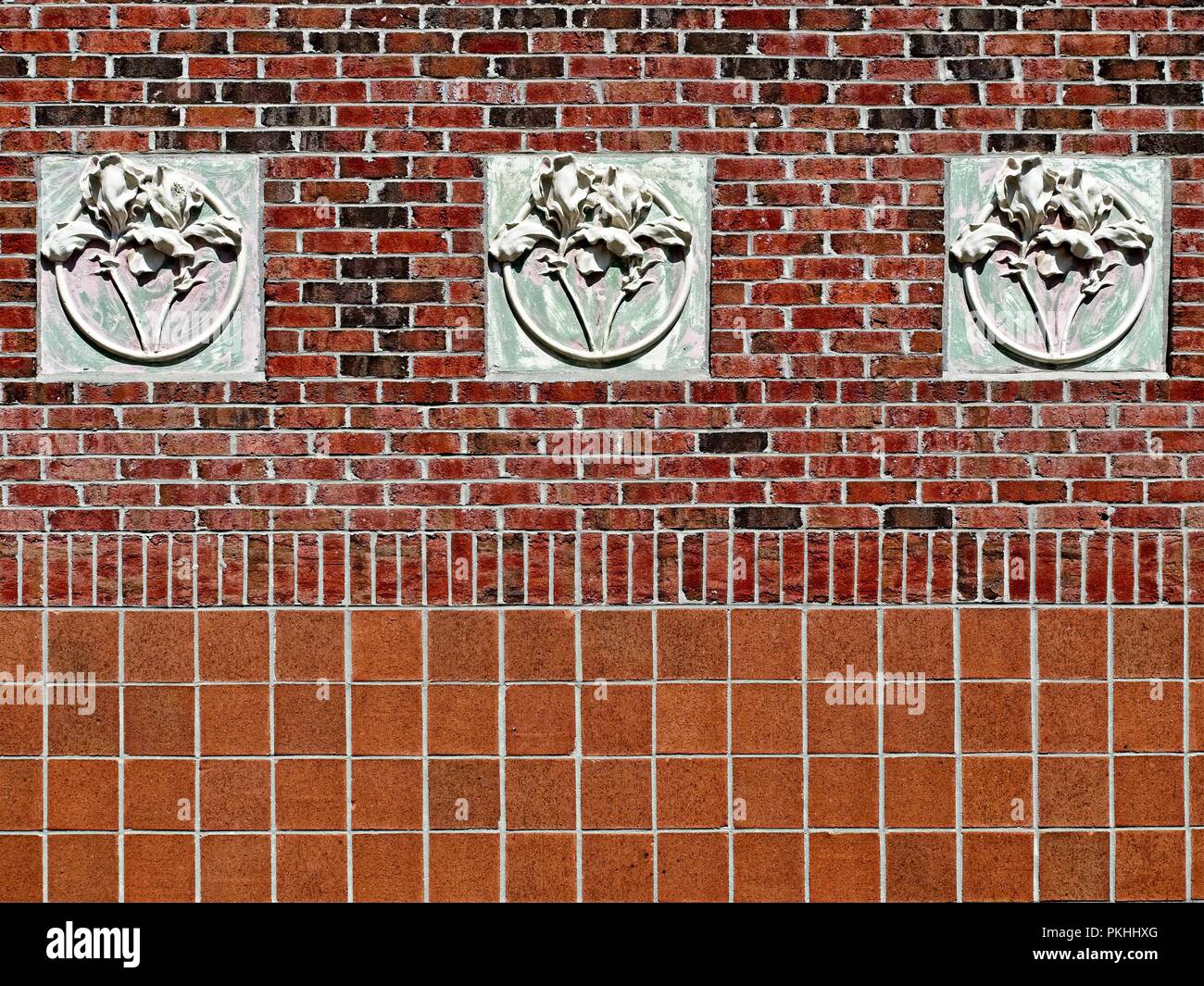 New Orleans, LA USA - May 9, 2018 - Concrete 3 Flowers on Red Brick ...