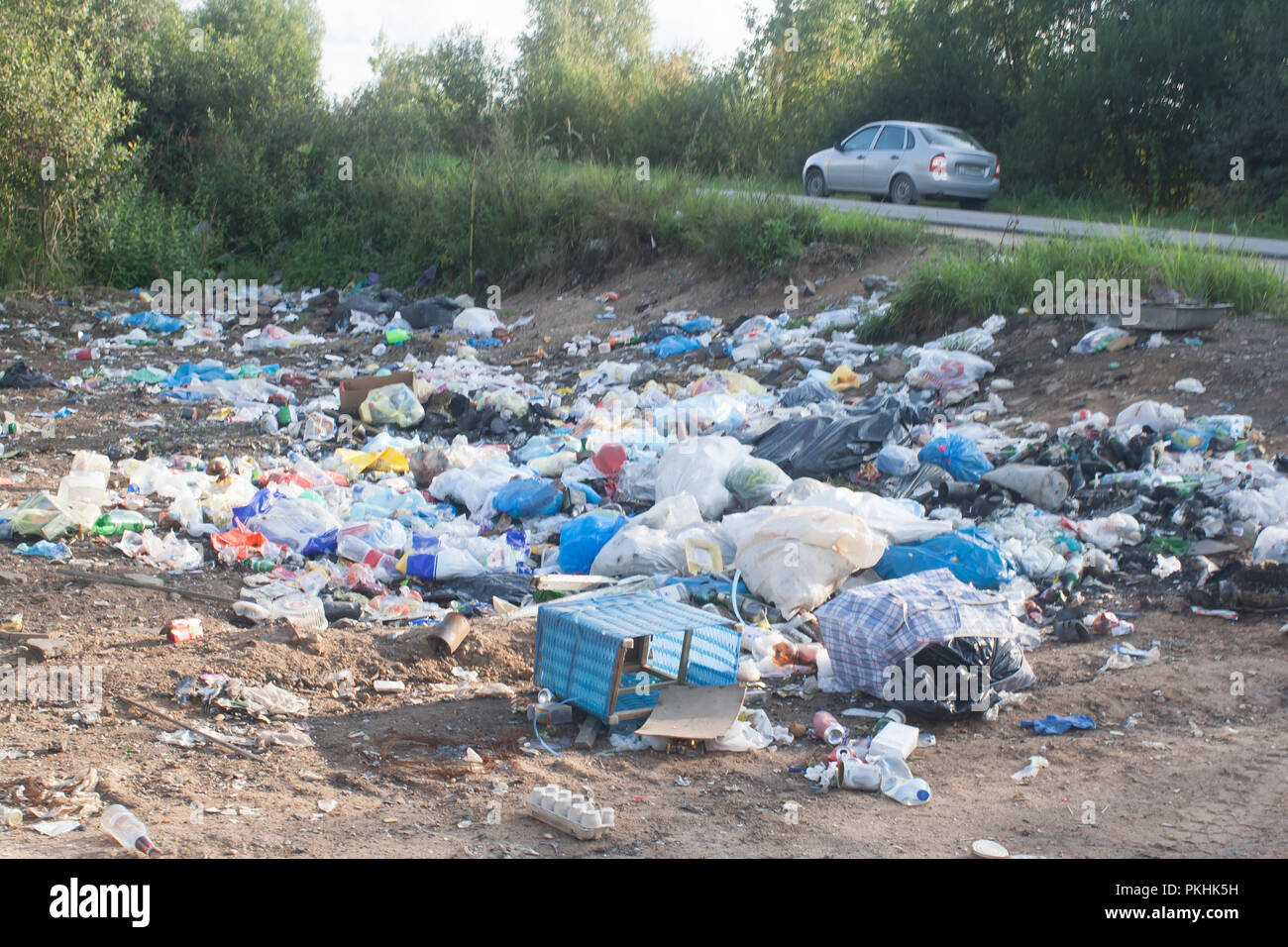 a garbage dump near the road Stock Photo - Alamy