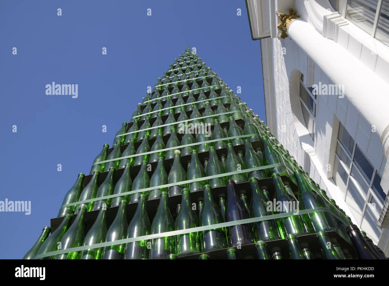 Christmas tree of bottles of champagne. Creative from bottles. Empty ...