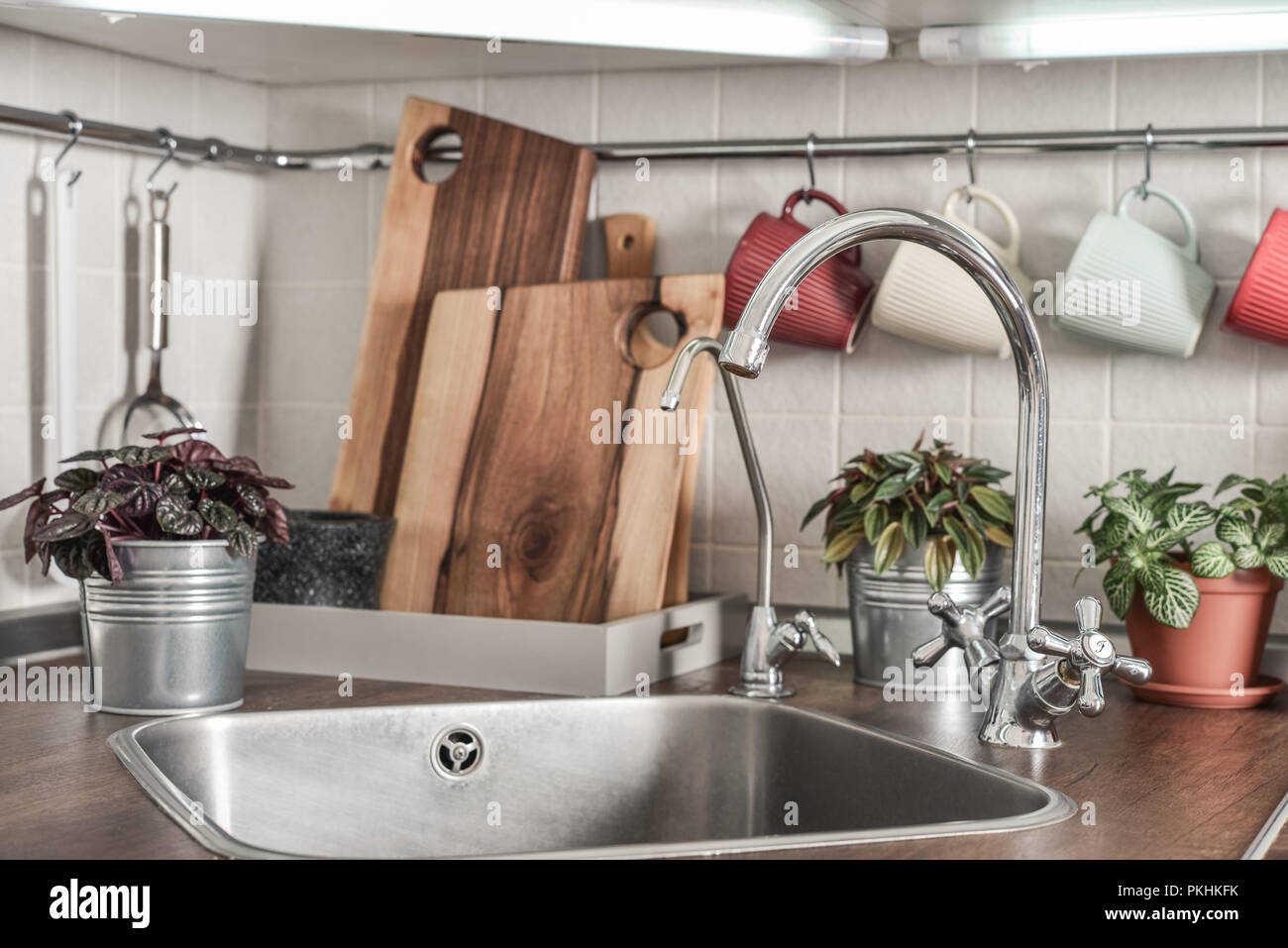 Interior of a modern domestic kitchen with water faucet closeup Stock ...
