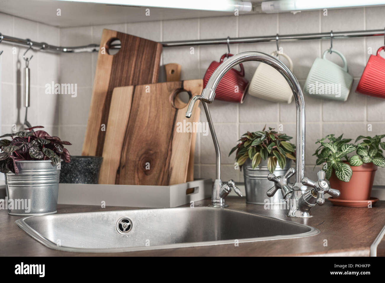 Interior of a modern domestic kitchen with water faucet closeup Stock ...