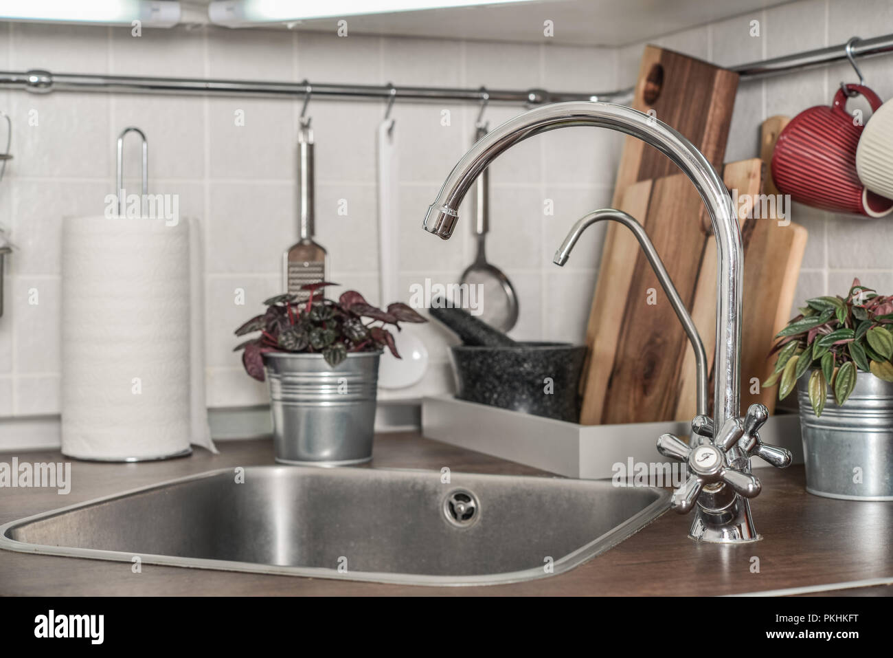 Interior of a modern domestic kitchen with water faucet closeup Stock ...