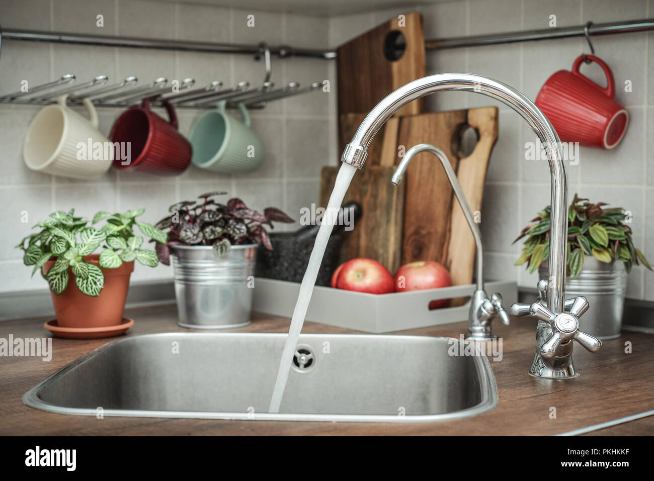 Interior of a modern domestic kitchen with water faucet closeup Stock ...