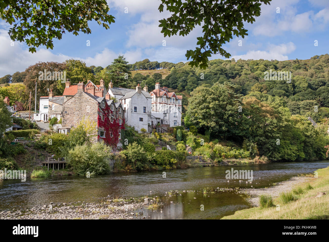 The picturesque riverside village of Carrog on the River Dee in the ...