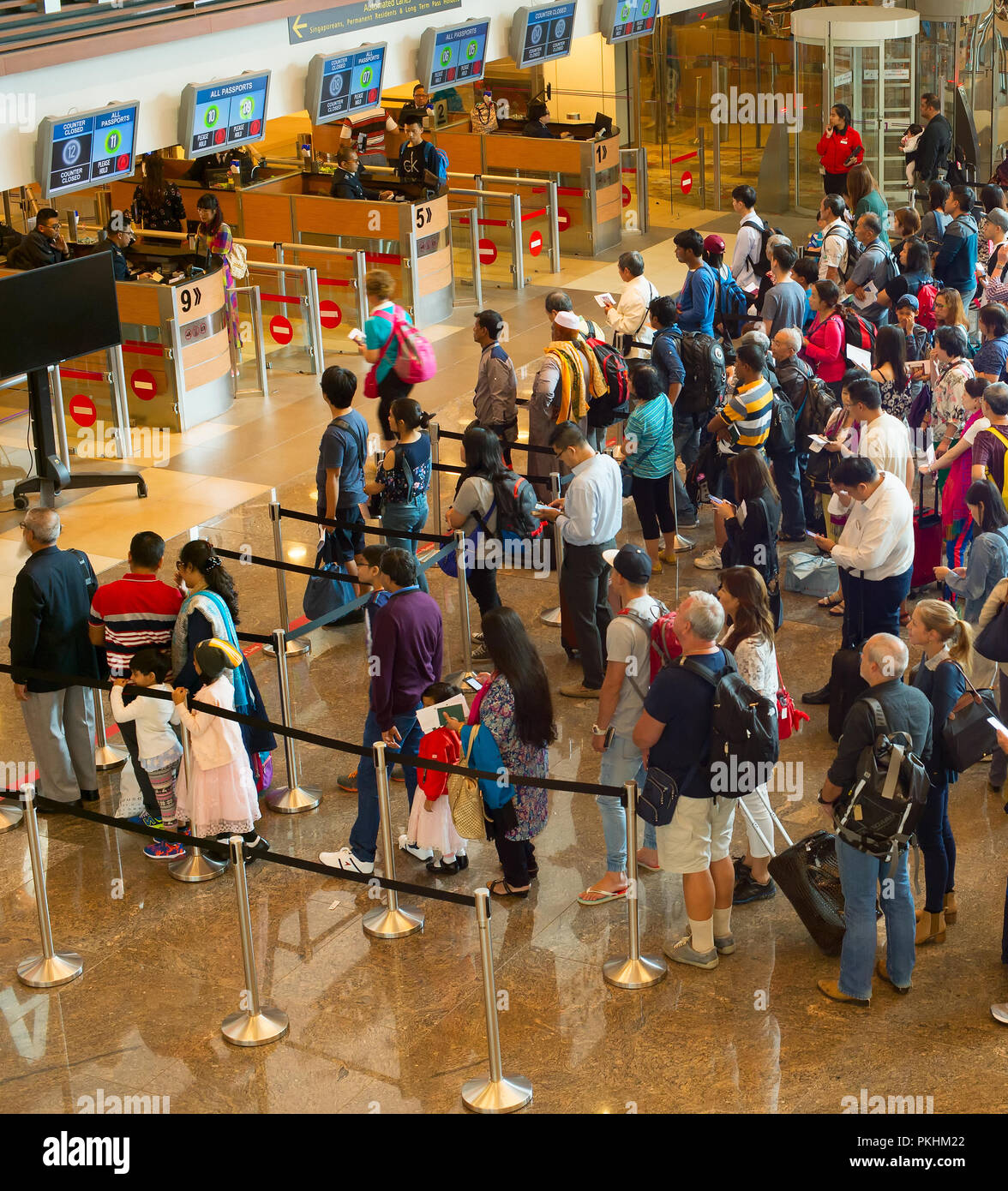 Immigration border control queue hi-res stock photography and images ...