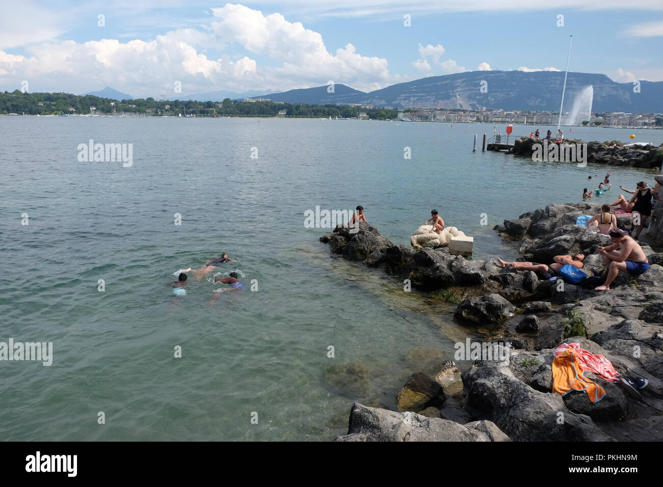 swimmers enjoying a summer swim in lake geneva, switzerland Stock Photo ...