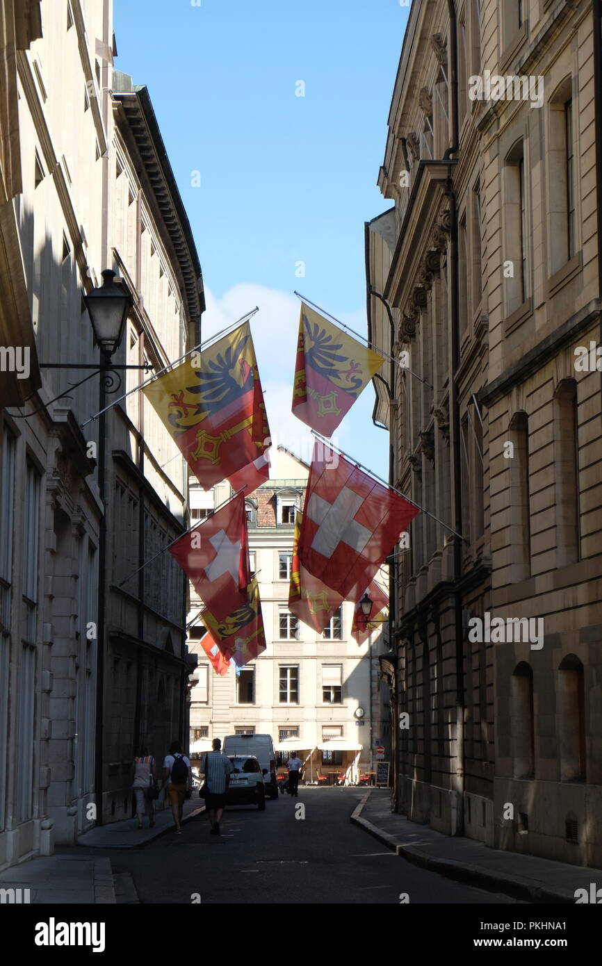 old town geneva showing swiss flag Stock Photo - Alamy