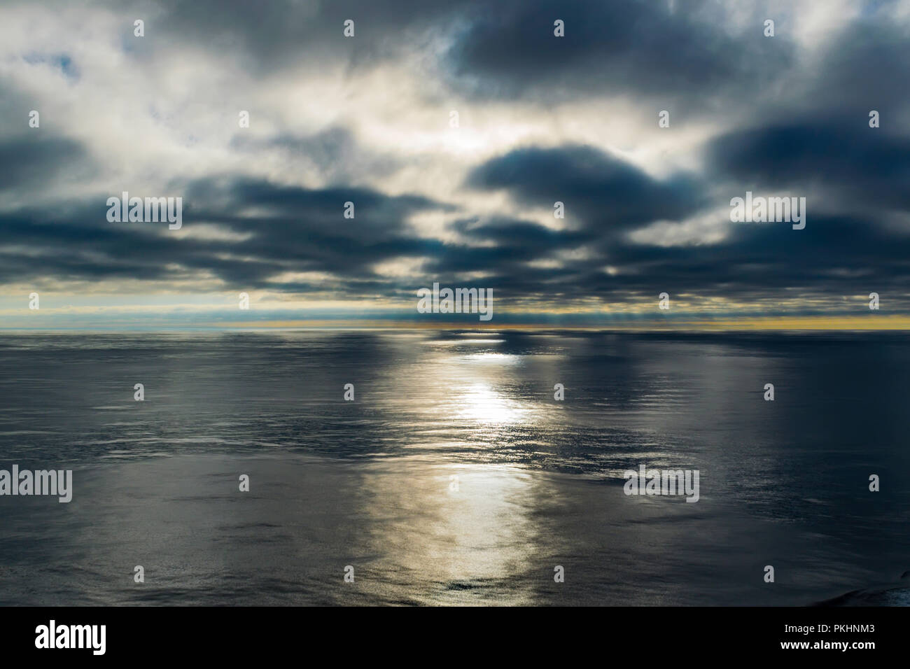 Sea mirrored clouds Stock Photo - Alamy