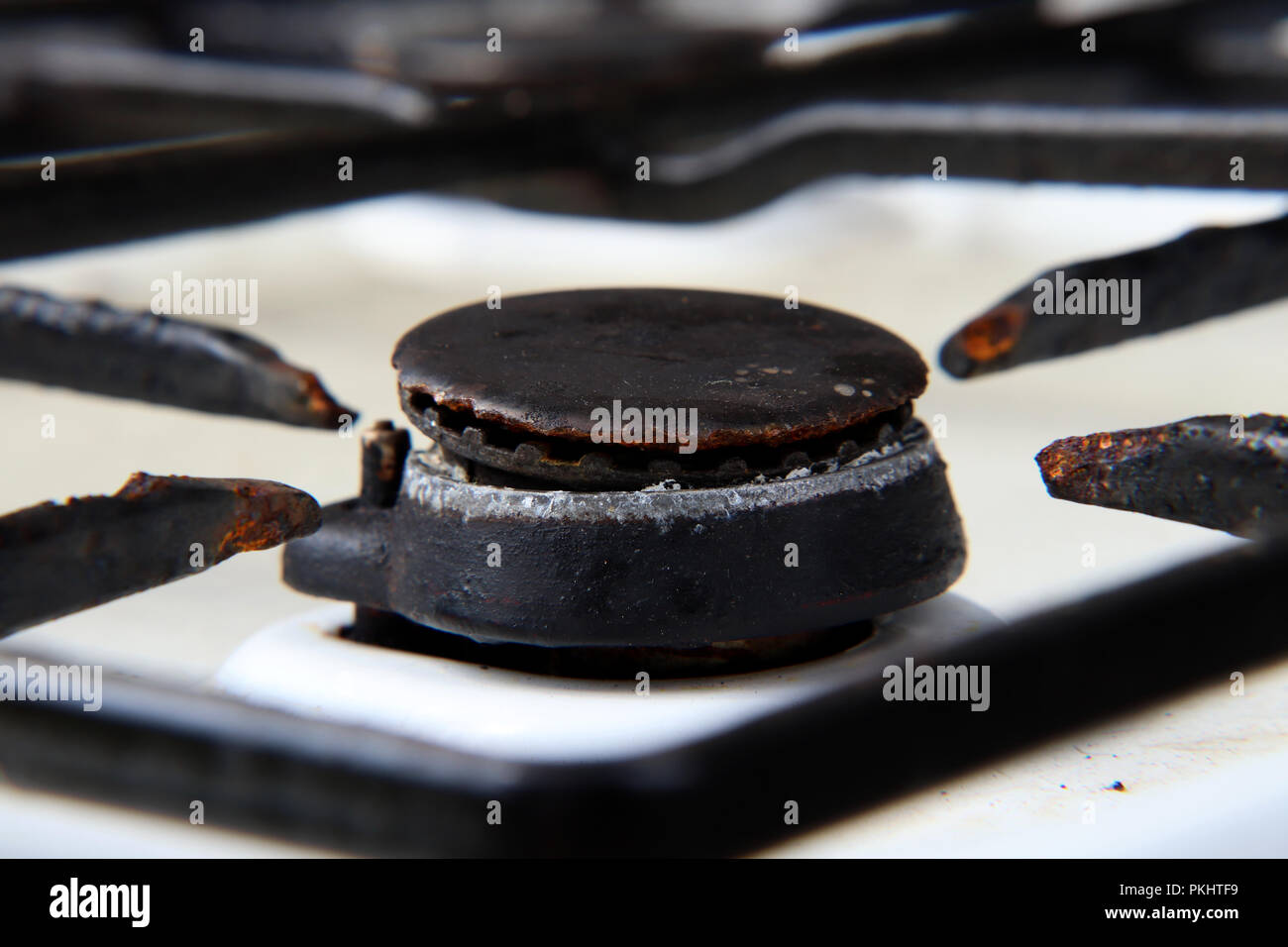 A very old rust cooker. View on gas burners especially on one. Good ...