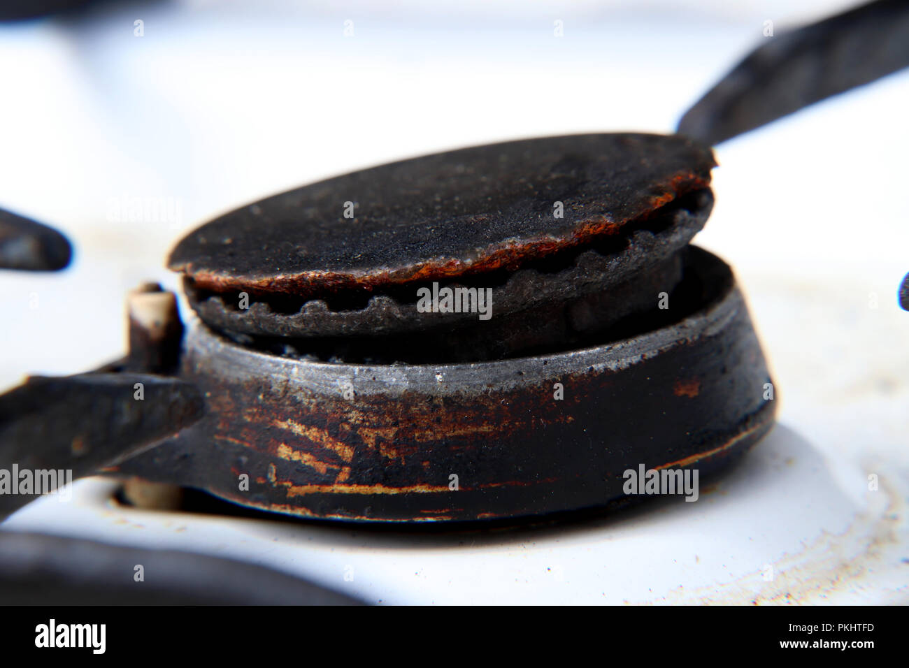 A one black rust gas burner on white cooker for warm up food for eating ...