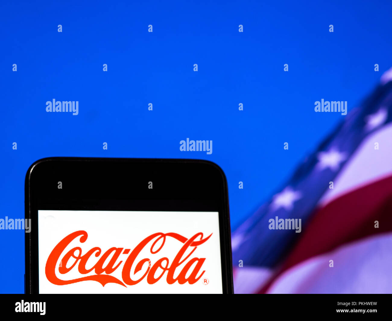 Coca-Cola logo seen displayed on smart phone Stock Photo - Alamy
