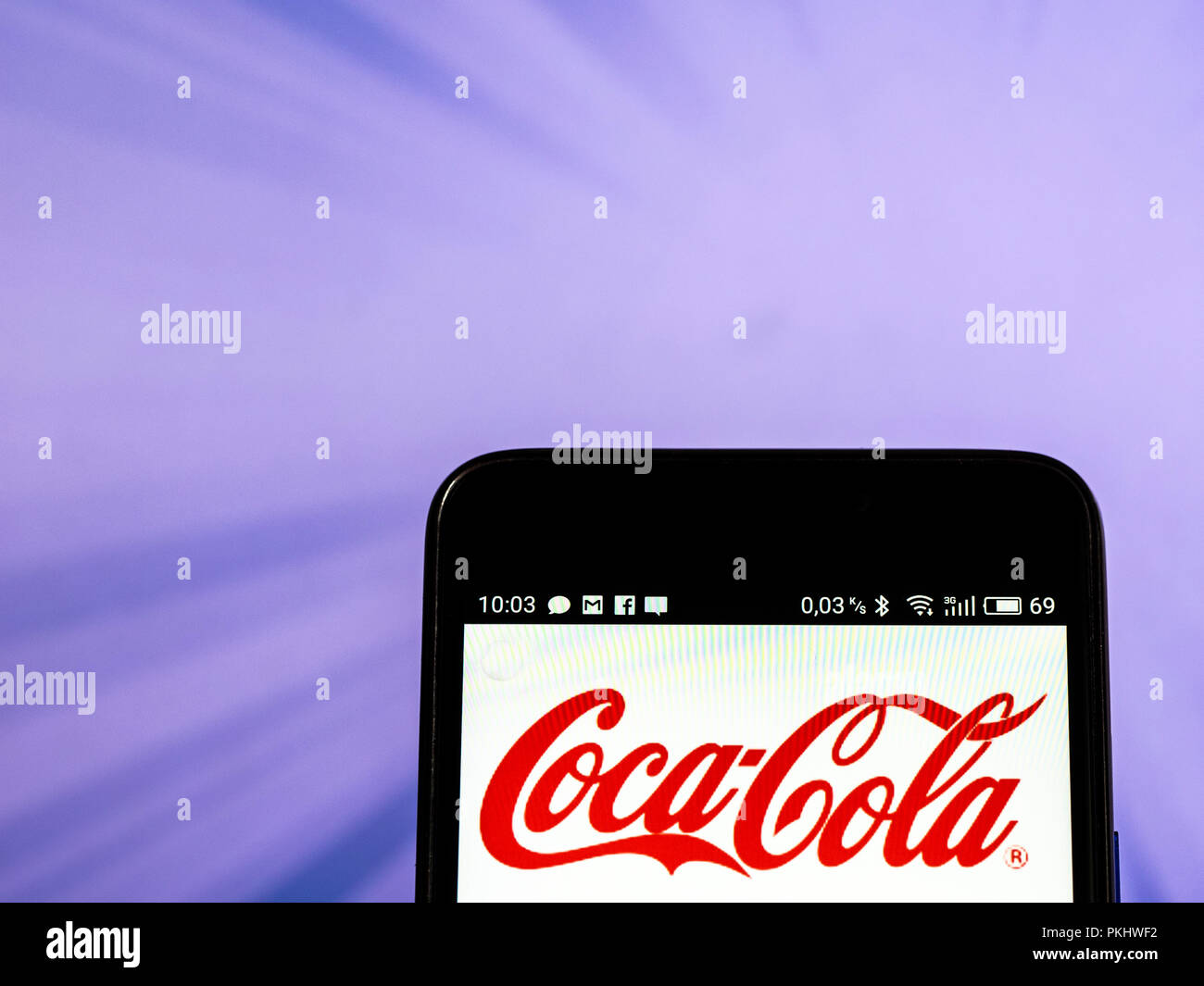 Coca-Cola logo seen displayed on smart phone Stock Photo - Alamy