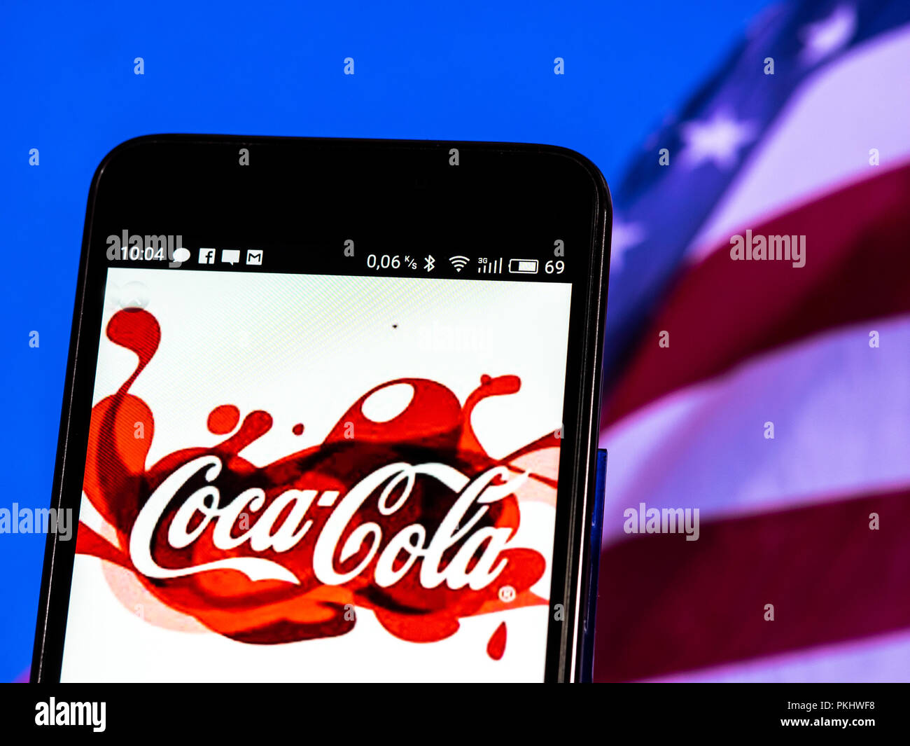 Coca-Cola logo seen displayed on smart phone Stock Photo - Alamy