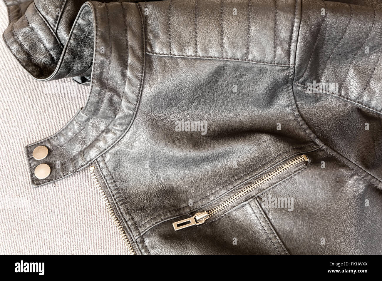 Stylish black leather jacket on the floor Stock Photo - Alamy