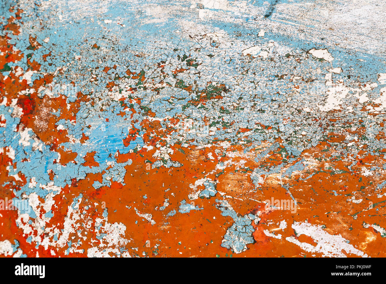 Crazed and Cracked Paint on Hull of Upturned Dinghy Stock Photo - Alamy