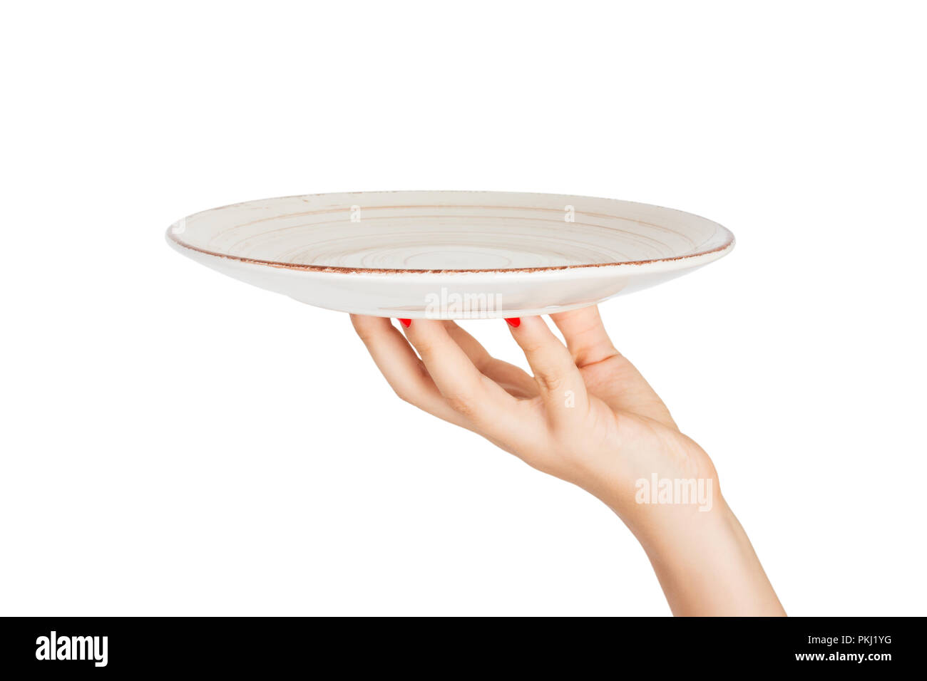 One white kitchen plate on human hand. perspective view, isolated on ...